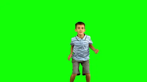 Little boy jumping on green screen | Stock Video | Pond5