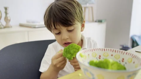 Boy Eating Broccoli Stock Videos – Royalty-Free HD & 4K Videos