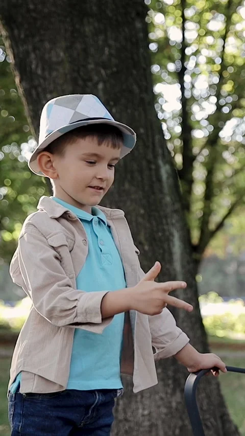 Little boy on a modern playground playin... | Stock Video | Pond5