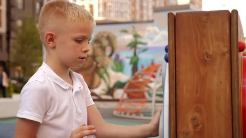 A little boy is playing interactive game... | Stock Video | Pond5