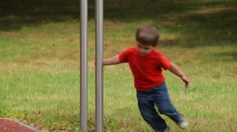 little boy running around the floor, spi... | Stock Video | Pond5