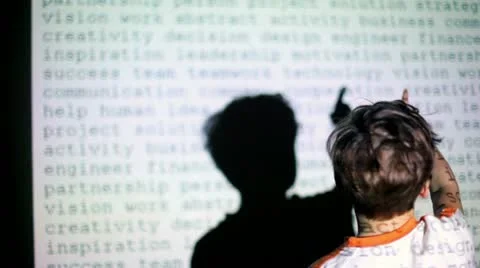 Little boy show on text projection on wa... | Stock Video | Pond5