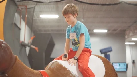 Mechanical Bull Ride Stock Video Footage | Royalty Free Mechanical Bull ...