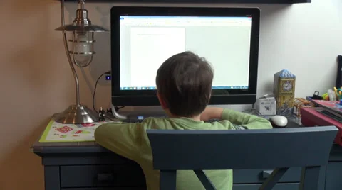 Little boy typing at a computer, kid, pu... | Stock Video | Pond5
