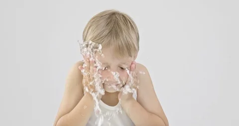 Little boy washing her face with water. ... | Stock Video | Pond5
