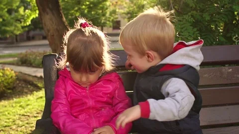 Little brother hugging his sad sister in... | Stock Video | Pond5