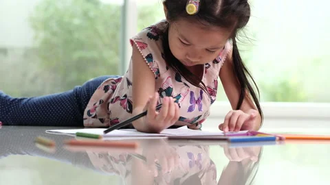 Little child girl enjoy writing, drawig ... | Stock Video | Pond5
