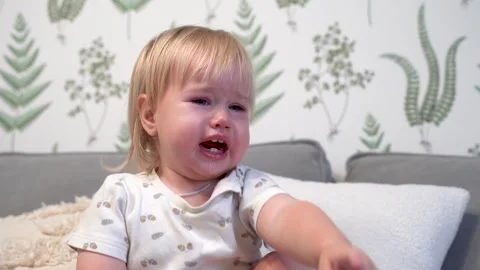 Little child toddler is crying and point... | Stock Video | Pond5