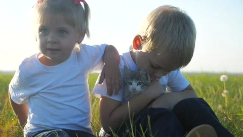 little children and cat concept happy fa... | Stock Video | Pond5