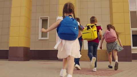 little children with backpacks run schoo... | Stock Video | Pond5