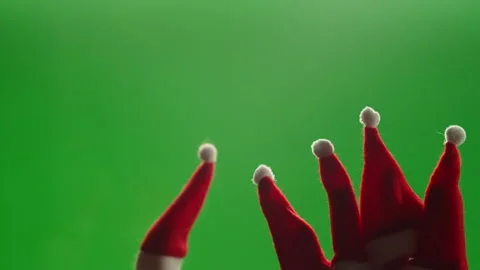 Little Christmas hats on green screen ch... | Stock Video | Pond5