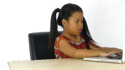 Little cute Girls are typing the compute... | Stock Video | Pond5