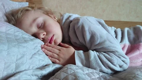 Little cute kid sleeping in bed. Concept... | Stock Video | Pond5