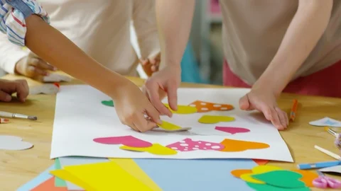 Little Diverse Kids Making Paper Craft w... | Stock Video | Pond5