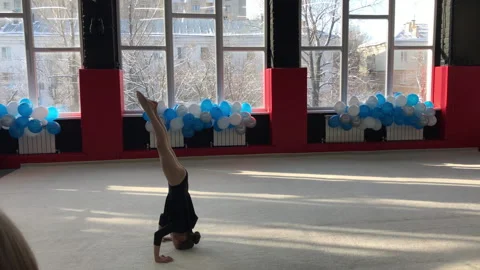 little girl an acrobat and gymnast perfo... | Stock Video | Pond5