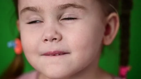 Little girl blinking eyes, slow motion o... | Stock Video | Pond5