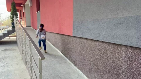 The little girl is coming home. | Stock Video | Pond5