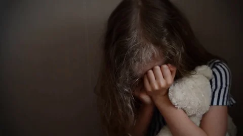 Little girl crying in the corner. Domest... | Stock Video | Pond5