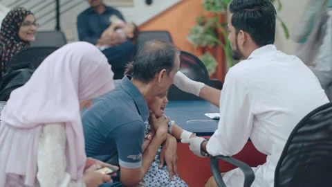 Little girl crying hard after being give... | Stock Video | Pond5