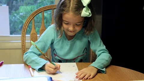 Girl Handwriting Table Stock Footage ~ Royalty Free Stock Videos | Pond5