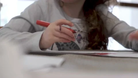 Little girl drawing on paper. Holding a ... | Stock Video | Pond5