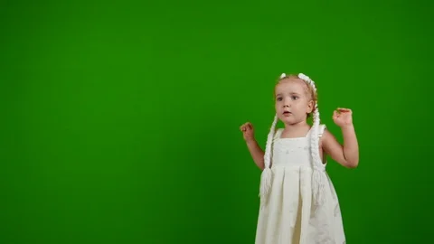 little girl emotions green screen | Stock Video | Pond5