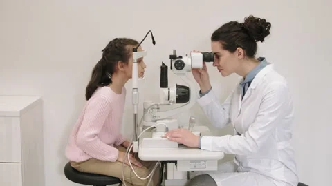 Little Girl At Eye Checkup | Stock Video | Pond5