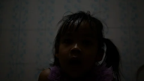 Little girl feel scared while sit on toi... | Stock Video | Pond5