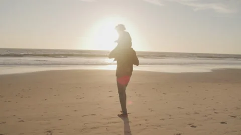 Little Girl Getting a Shoulder Ride by H... | Stock Video | Pond5