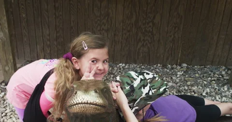 Little girl with an injured arm making f... | Stock Video | Pond5