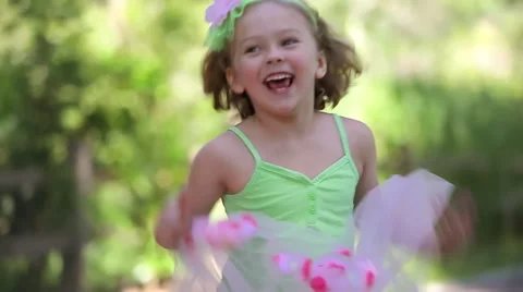 Little Girl Jumps Up And Down With Excit... | Stock Video | Pond5