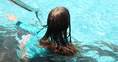 Little girl learns basics of freestyle s... | Stock Video | Pond5