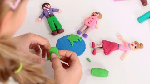 Little girl making a happy people and ea... | Stock Video | Pond5