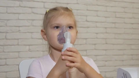 Little Girl Making Inhalation in Inhalat... | Stock Video | Pond5