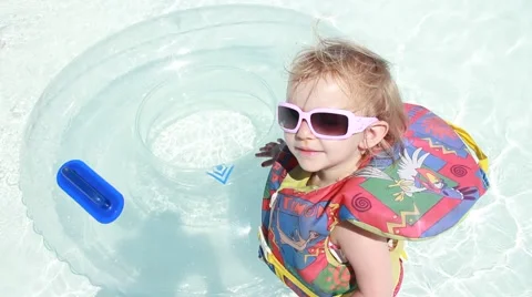 Inner Tube Girl Stock Footage ~ Royalty Free Stock Videos | Pond5