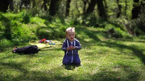 Little girl playing with a small ball si... | Stock Video | Pond5