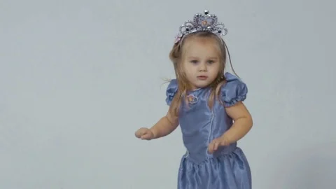 Little girl in princess costume jumping ... | Stock Video | Pond5