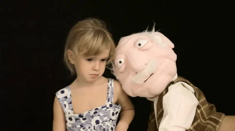 Little girl puppet sad play | Stock Video | Pond5