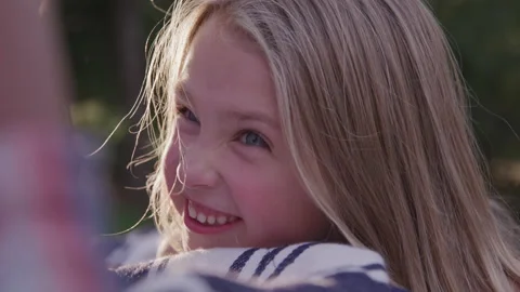 Little Girl Smiles and Crinkles Her Nose... | Stock Video | Pond5