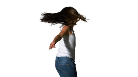 Little girl spinning around on white bac... | Stock Video | Pond5