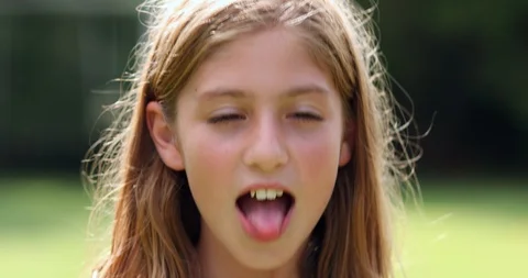 Little Girl Sticking Out Tongue Stock Videos – Royalty-Free HD & 4K Videos | Pond5