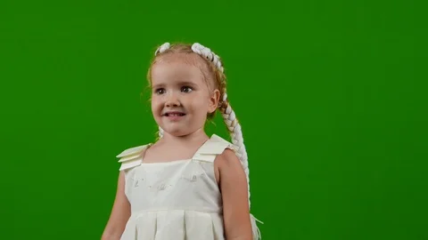 little girl white dress green screen | Stock Video | Pond5