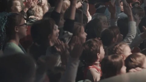 Little girls crowd clapping in concert h... | Stock Video | Pond5