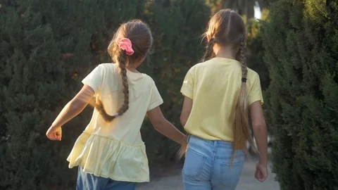 Little girls running in a hedge maze, tw... | Stock Video | Pond5