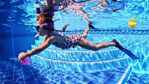 Little girls, sisters, triplets swim in ... | Stock Video | Pond5