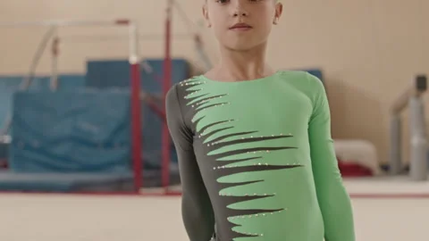 Little Gymnast Doing Splits on Floor in ... | Stock Video | Pond5