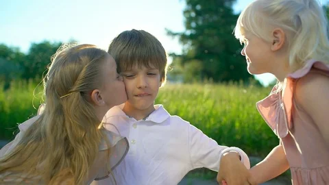 Boy Kissing Girls Stock Videos – Royalty-Free HD & 4K Videos