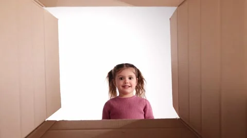Little happy girl, child unpacking, open... | Stock Video | Pond5