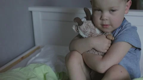 little kid boy preparing to sleep huggin... | Stock Video | Pond5
