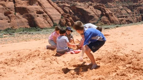 Little kids digging and playing in fun s... | Stock Video | Pond5